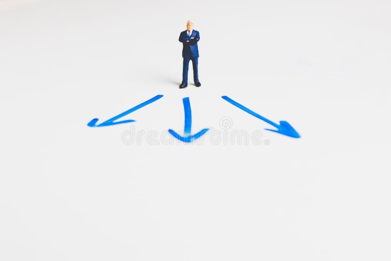Miniature Businessman Standing on Arrow Pathway Stock Photo - Image of ... Miniature Businessman Standing on Arrow Pathway Stock Photo - Image of ...