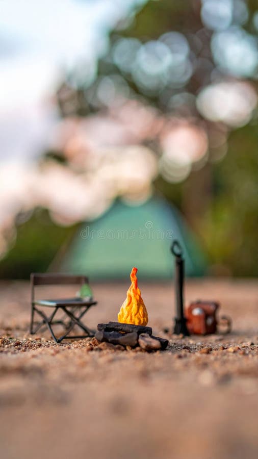 Miniature Camping Scene with Campfire Tent Chair and Backpack on Sand ...