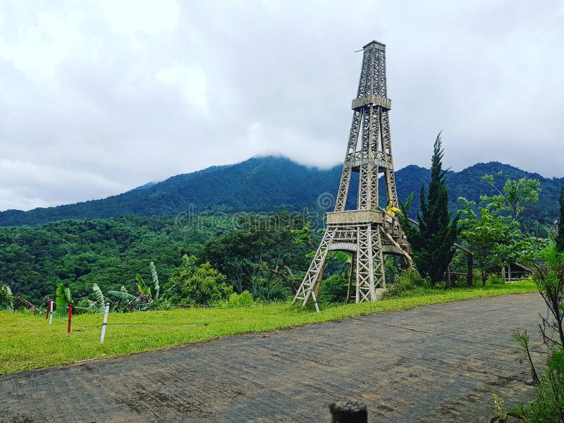 Miniature of Eiffel Tower and Beautiful Mountain Background Stock Photo ...