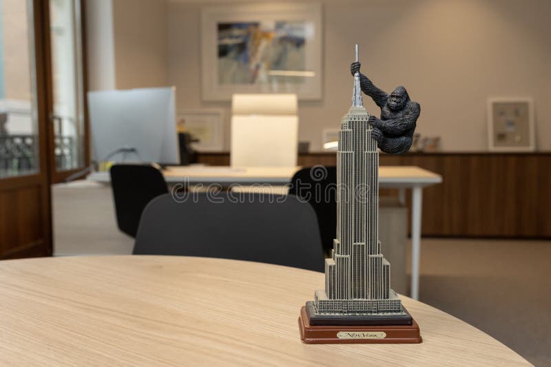 An Empire State Building Statue in Front of an Office Desk Stock Photo ...