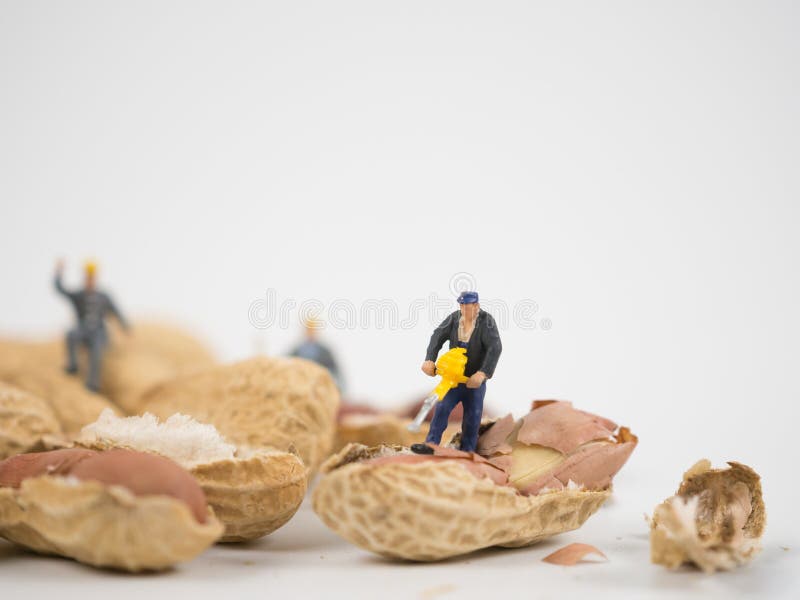 Miniature Engineer is Working on Nuts. Stock Image - Image of large ...