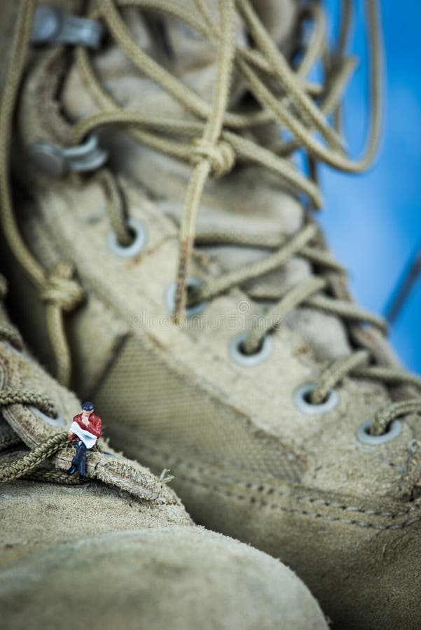 Small Man Reading on Army Boots Stock Photo - Image of thinking ...