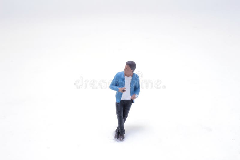 Miniature Figure Standing , a Figurines of People Standing Stock Photo ...