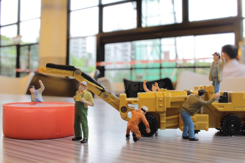 Miniature Figure of Technicians Working Stock Photo - Image of working ...