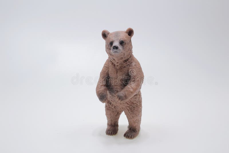 A Miniature Figure of a Toy Bear, Isolate on a White Background Stock ...