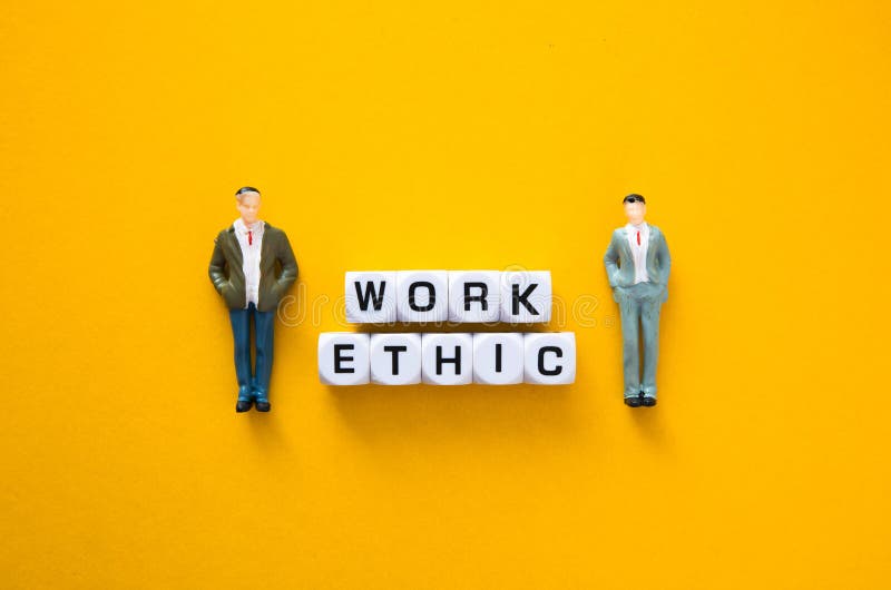Miniature Figure with Work Ethic Words on Yellow Background Stock Photo ...