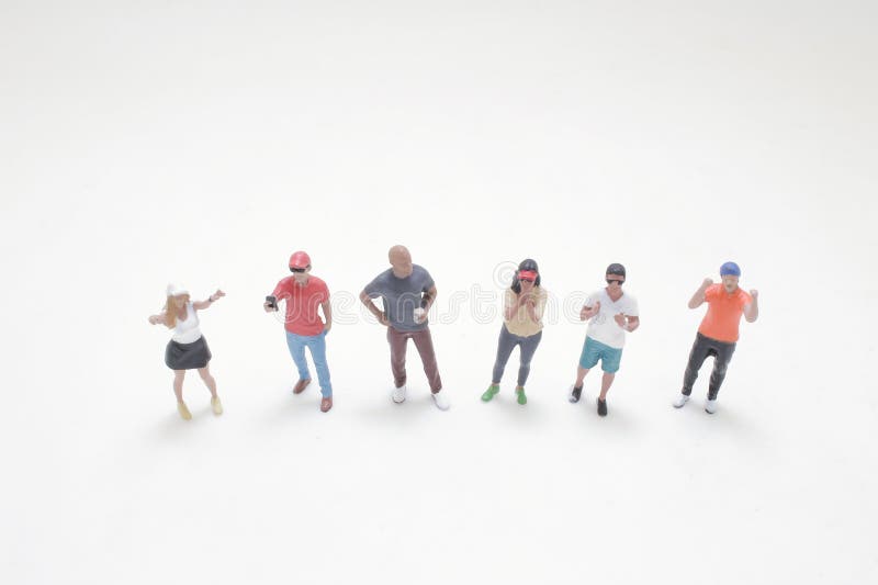 Miniature Figures of a Group of People Celebrating Stock Photo - Image ...