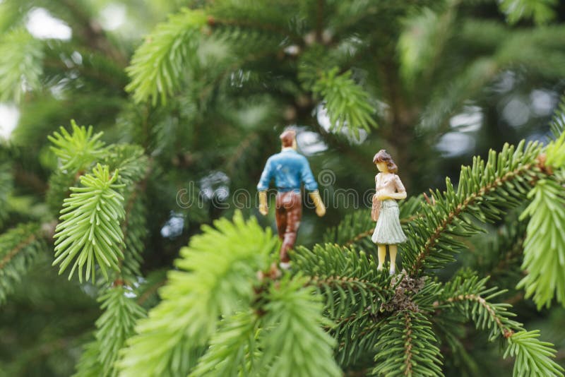 Miniature Figures Talking on the Tree Stock Photo - Image of outdoor ...