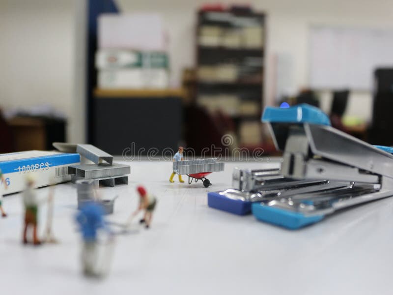 Miniature Figures of Workers Stock Photo - Image of document, office ...