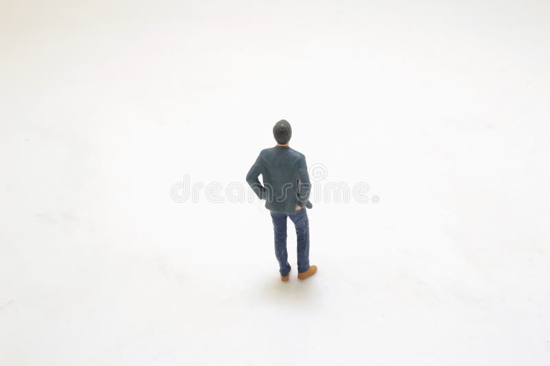 A Miniature Figurine of Casual Man on Simple Stock Image - Image of ...