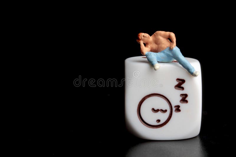 Miniature Figurine of a Man Lying on the Sleep Sign Stock Photo - Image ...
