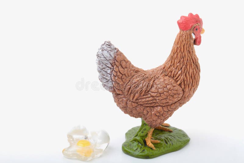 Miniature Figurine Toy of an Hen with a Broken Egg Stock Image - Image ...