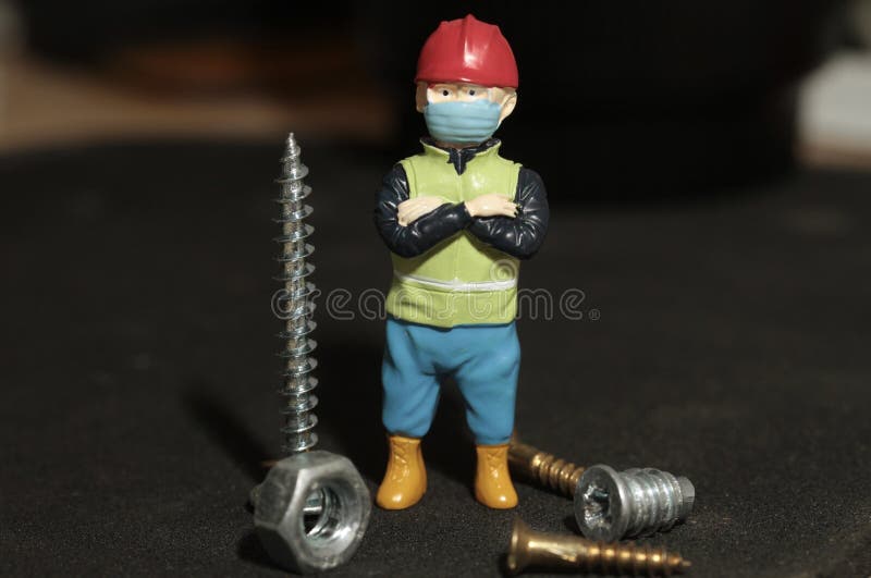 Miniature Figurine of a Worker with Protective Mask and Helmet with ...