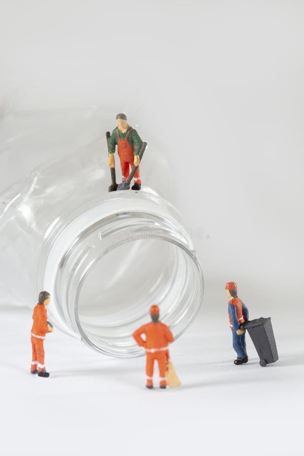 Miniature Garbage Man Recycling and Cleaning a Soft Drink Can Stock ...