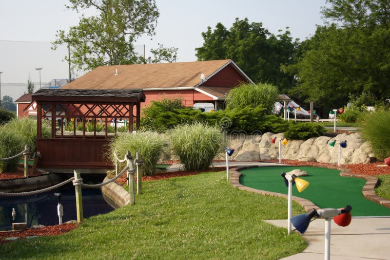 Miniature Golf Course at Night Stock Photo - Image of grass, fountain ...