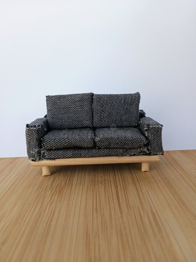 Miniature Homemade Sofa on a Wood Floor and White Wall Stock Photo ...