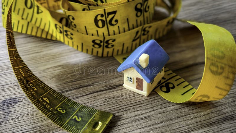 Miniature House on a Tape Measure Stock Image - Image of precision ...