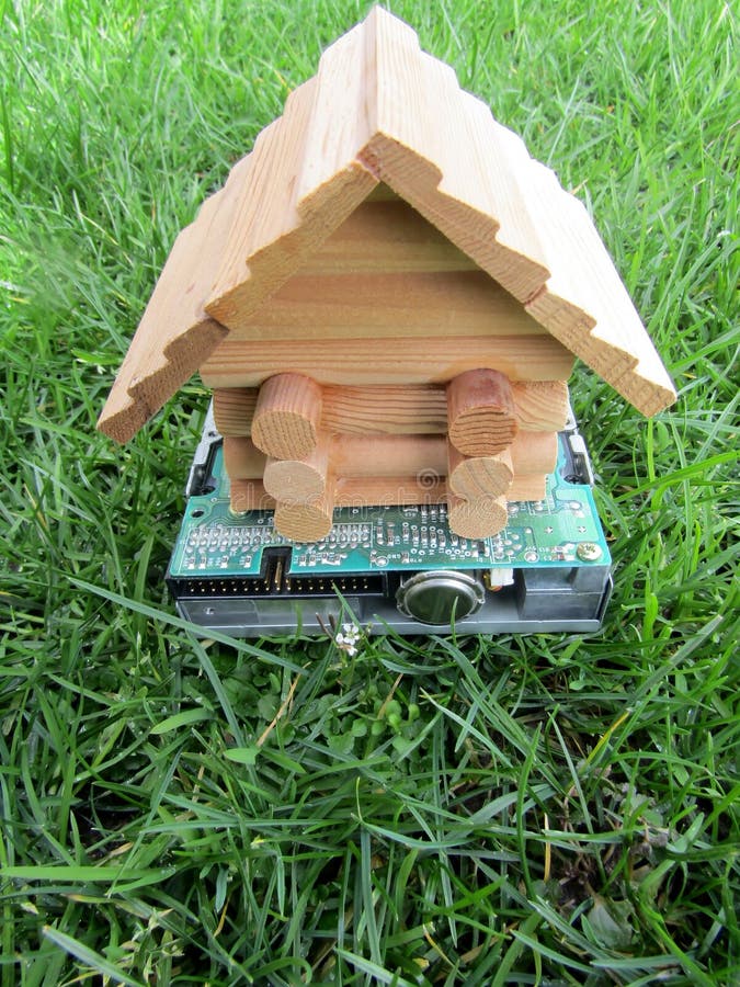 Miniature Log Cabin Standing on Computer Circuit Board. Stock Image ...