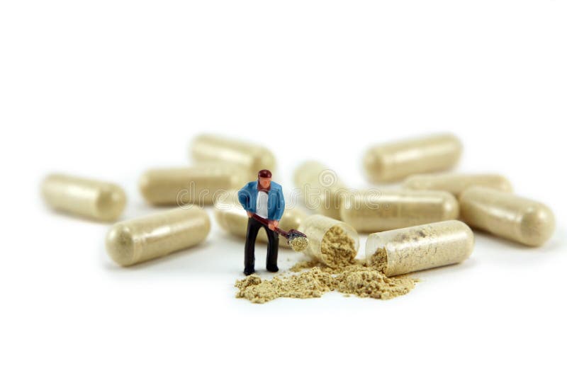 Miniature Man Digging Medicine Stock Photo - Image of abstract ...