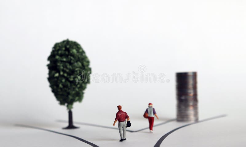 Miniature Man and Miniature Woman Walking on Different Paths. Stock ...