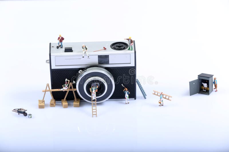 Miniature men working stock photo. Image of employees - 67166230