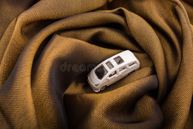 Miniature Metal Car on a Fabric Cloth Stock Image - Image of cars ...