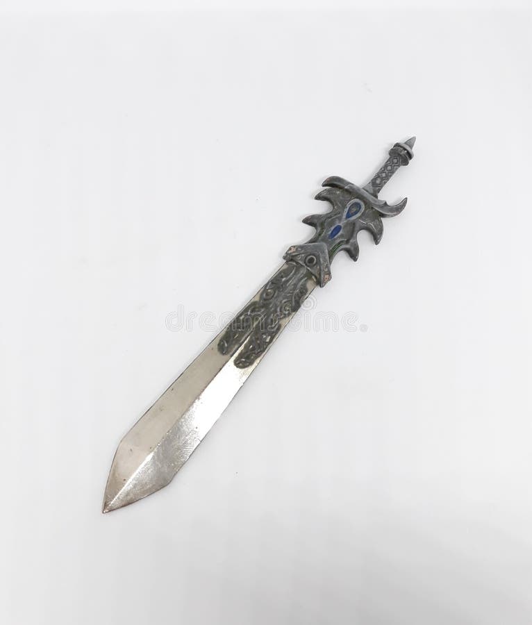 Miniature metal sword stock image. Image of swagger - 129424665