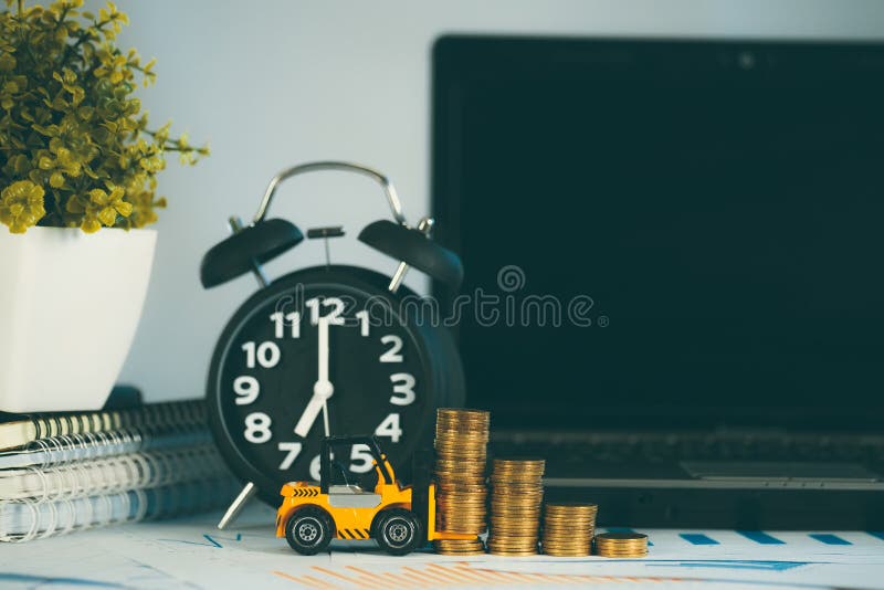 Miniature Mini Forklift Truck with Coin Stack on Working Table with ...