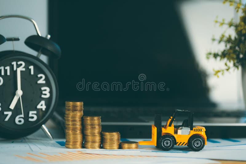 Miniature Mini Forklift Truck with Coin Stack on Working Table with ...