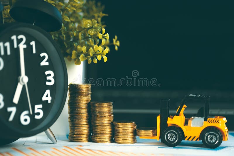 Miniature Mini Forklift Truck with Coin Stack on Working Table with ...