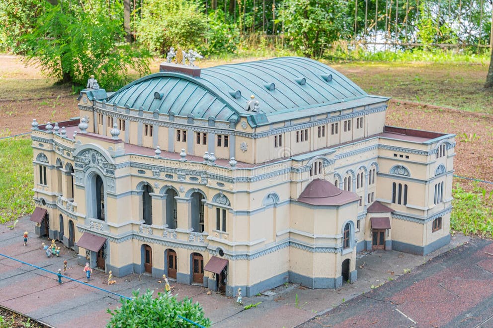 A Miniature Model of a White, Classical Architecture-inspired Building ...