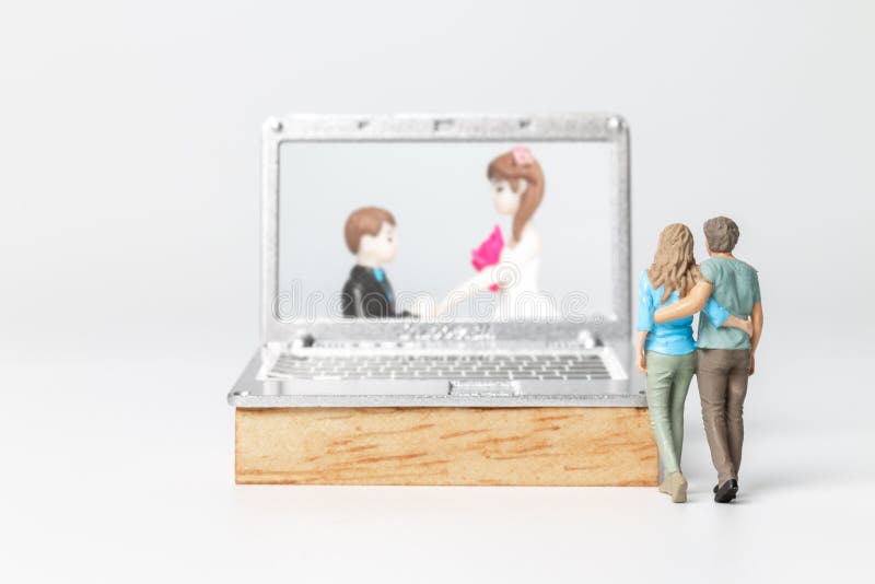 Miniature People Bride and Groom Virtual Wedding on Computer Screen ...