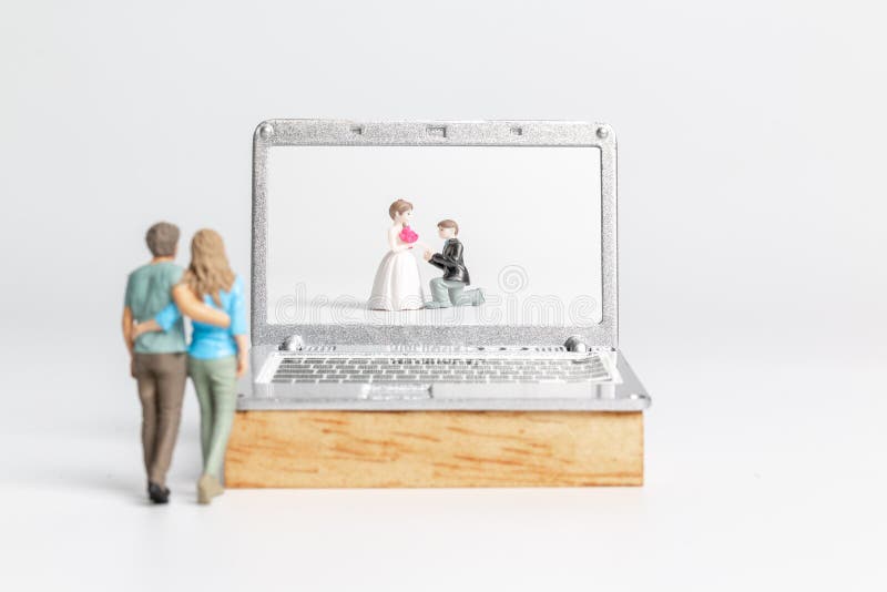 Miniature People Bride and Groom Virtual Wedding on Computer Screen ...