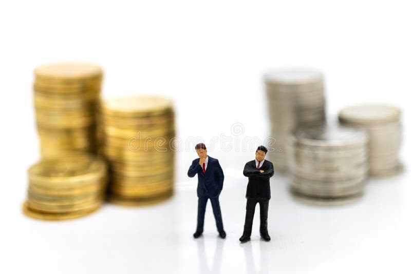 Miniature People : Businessman Looking the Profits from Doing Business ...