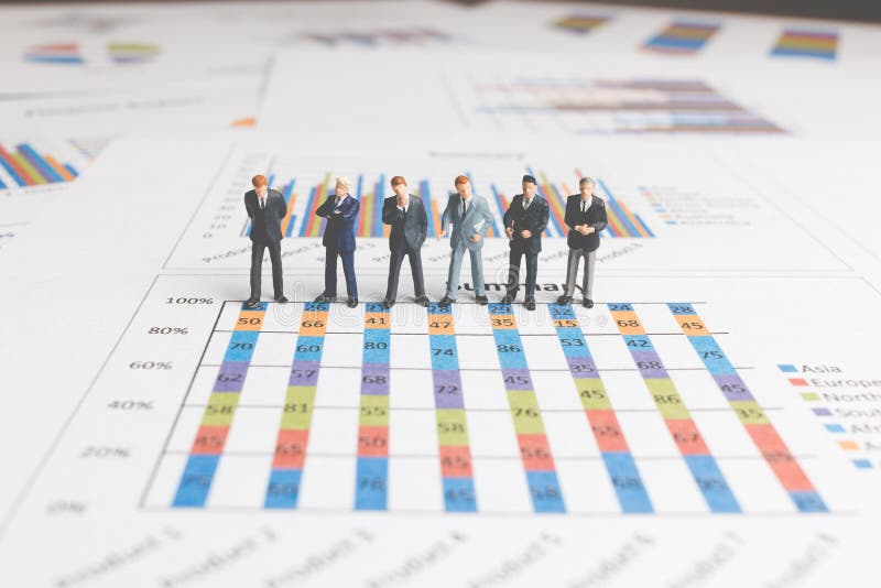 Miniature People : Businessman Standing on a Paper Graph Chart Stock ...