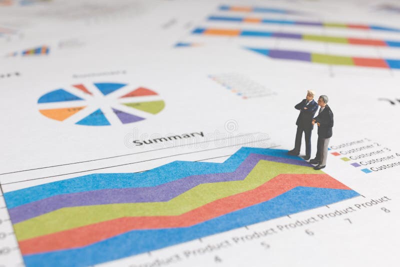 Miniature People : Businessman Standing on a Paper Graph Chart Stock ...