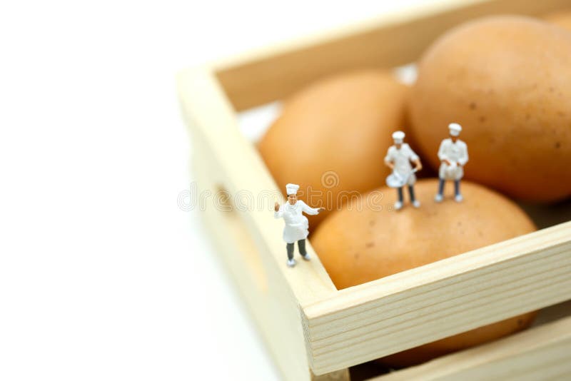 Miniature People : Chef during Cooking and Working with Eggs. Stock ...