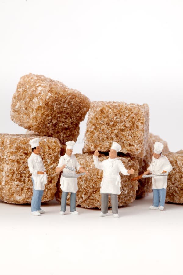 Miniature People: Chefs Cook in Front, Cubes of Brown Sugar Stock Image ...