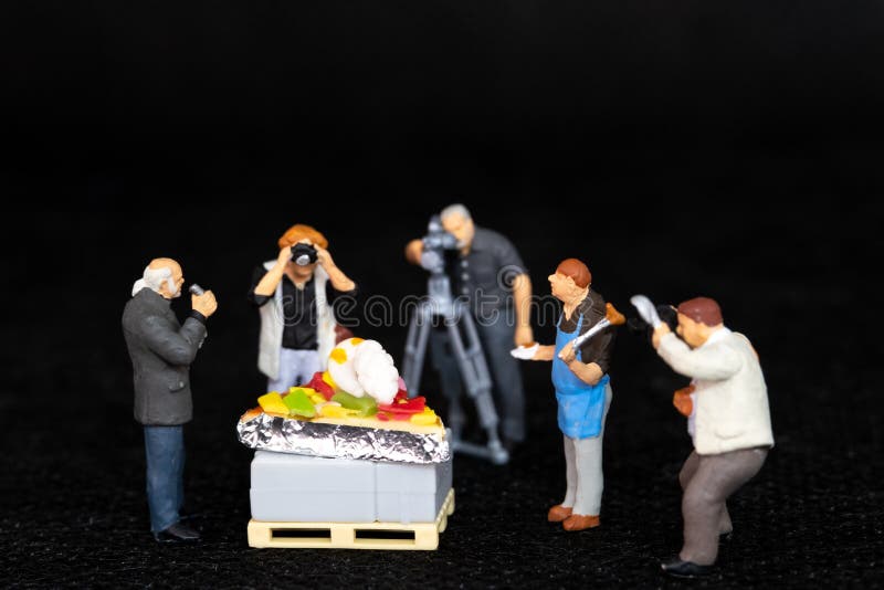 Miniature People Chefs is Preparing a Bakery in the Studio Stock Photo ...