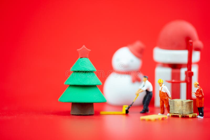 Miniature People Creating Christmas Decorations. Creative Concept in ...