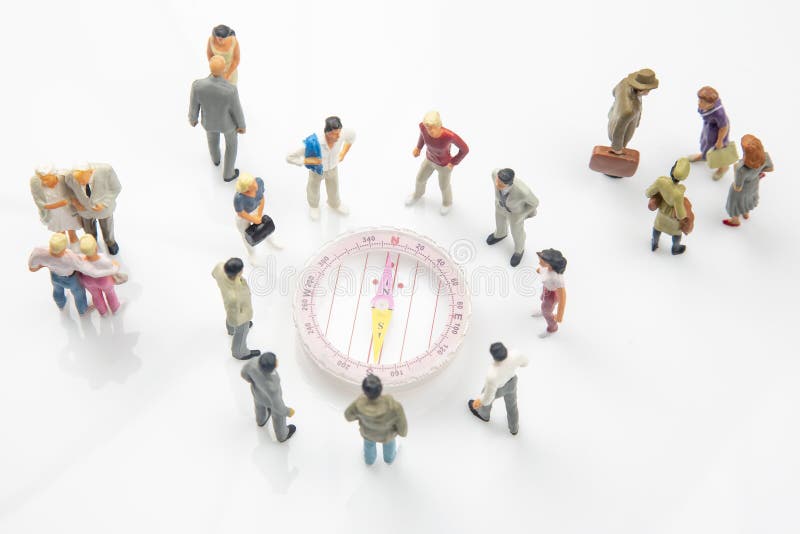 Miniature People. Different People are Standing Near the Compass Stock ...