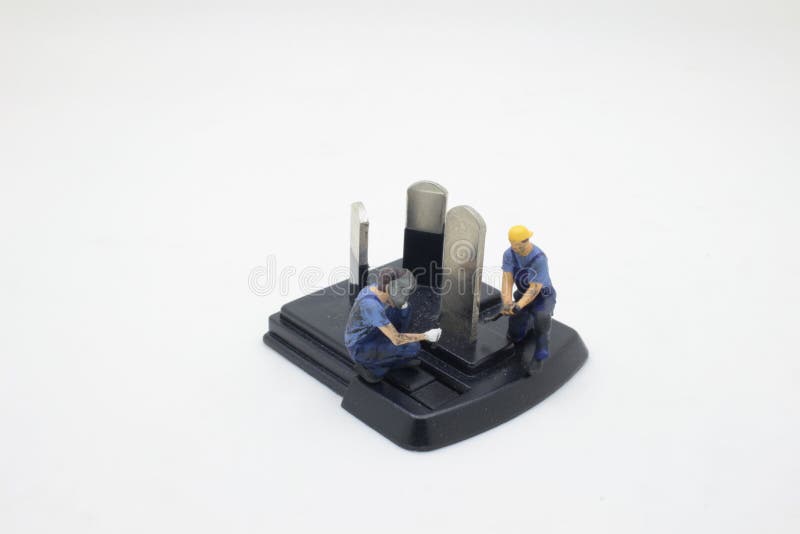 A Miniature People Engineer Worker Construction Concept Stock Photo ...