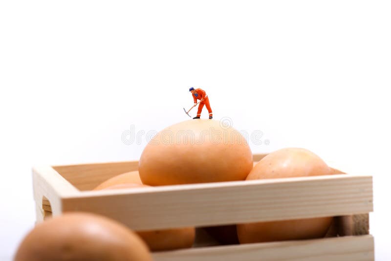 Miniature People : Man Working on Eggs, Idea or Easter Day Concept ...