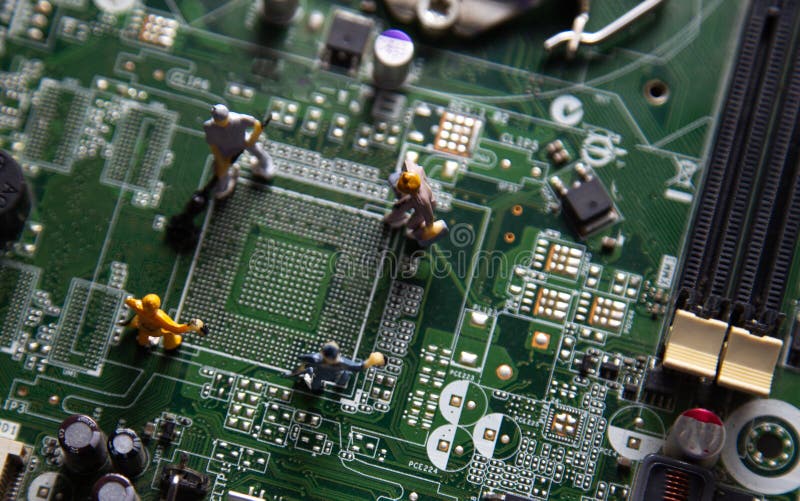 Miniature People Motherboard and CPU Repair, Concept: Working in ...