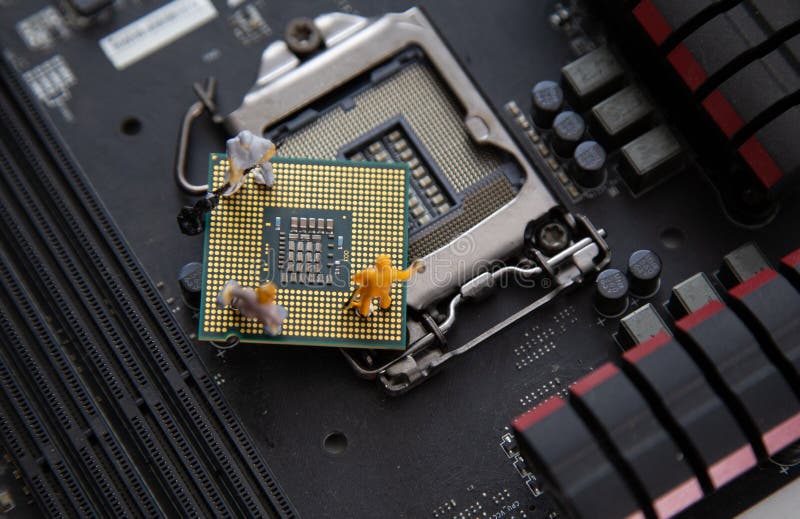 Miniature People Motherboard and CPU Repair, Concept: Working in ...