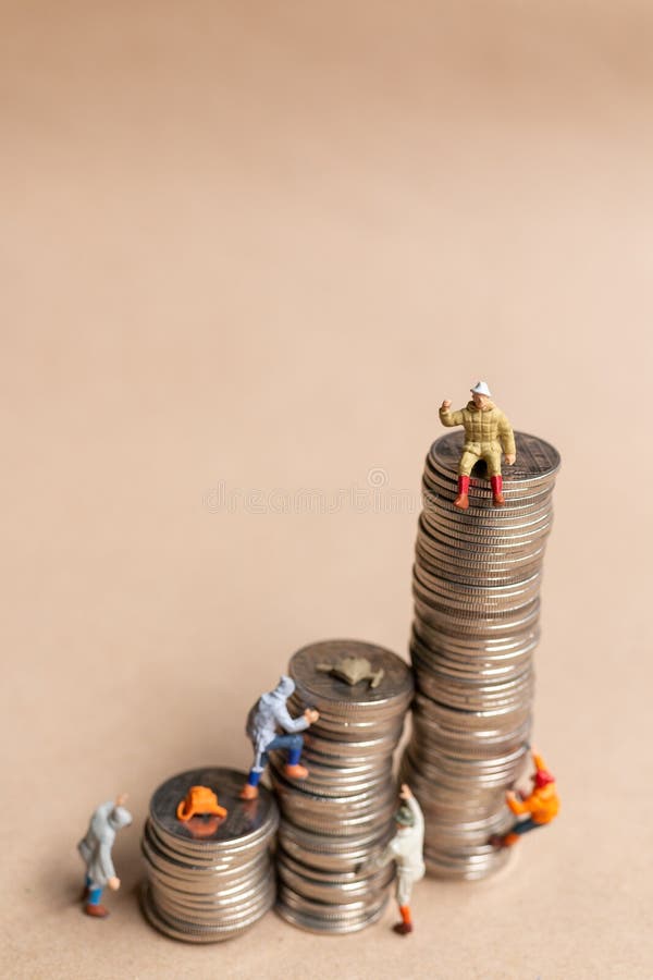 Miniature People Mountain Climber Ascending the Coin Stack Stock Image ...