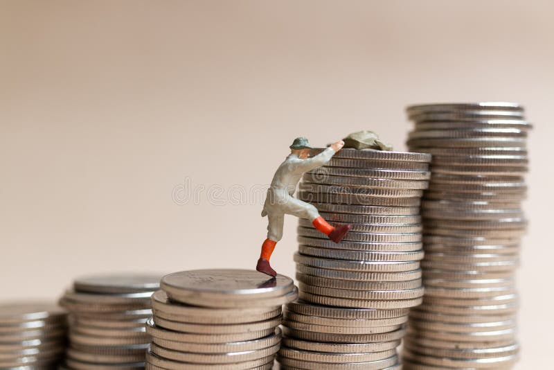 Miniature People Mountain Climber Ascending the Coin Stack Stock Image ...