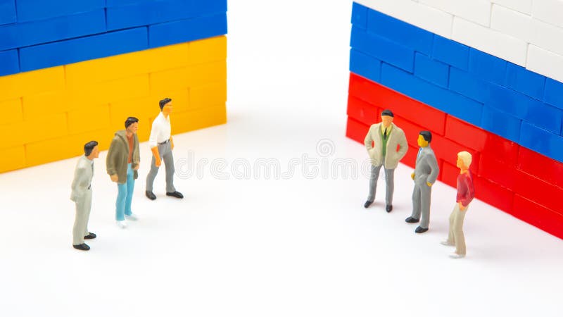 Miniature People. National Ukrainian and Russian Flag from Colored ...