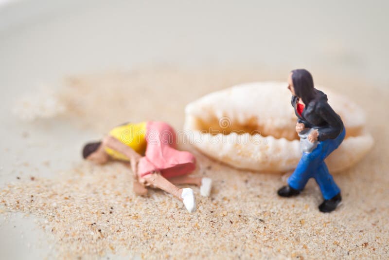 Miniature People Sitting on a Shell Stock Image - Image of action, dead ...