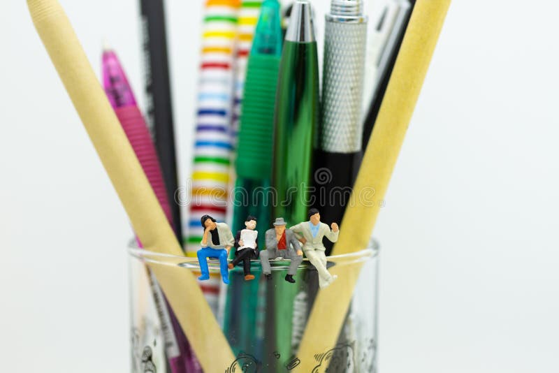 Miniature People Sitting with Tools for Learning. Image Use for ...